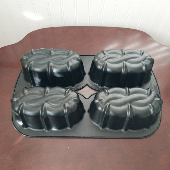 Nordic Ware | Kitchen | Nordic Ware Celtic Knot Bundt Mini Loaf Pan ...